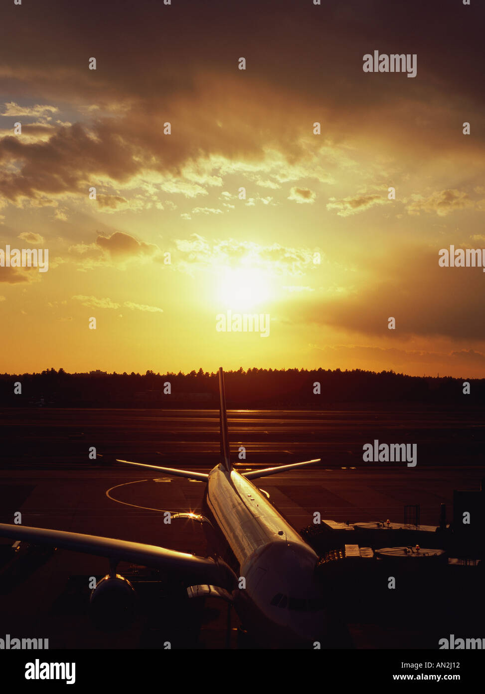 Passenger airplane at airport Stock Photo - Alamy