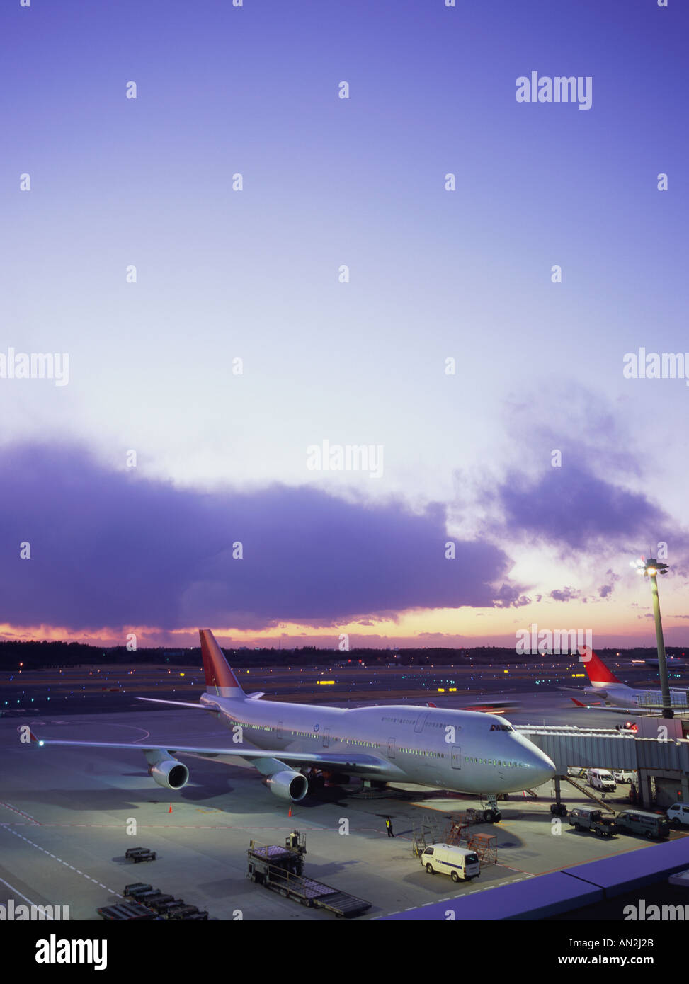 Passenger airplane at airport Stock Photo - Alamy
