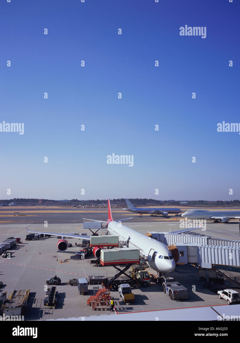 Passenger airplane at airport Stock Photo - Alamy