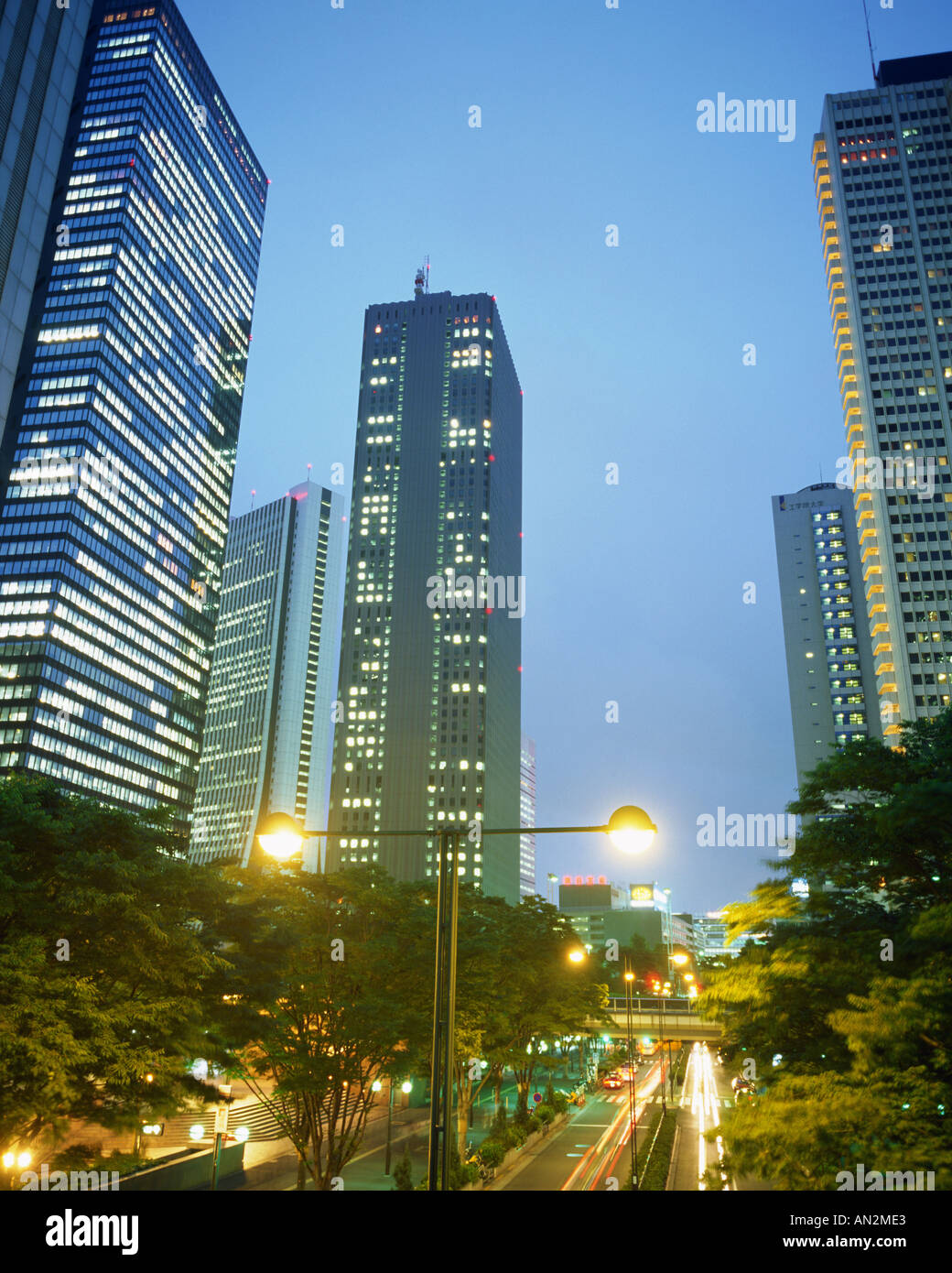 Illuminated high buildings in Shinjuku Tokyo Japan Stock Photo - Alamy