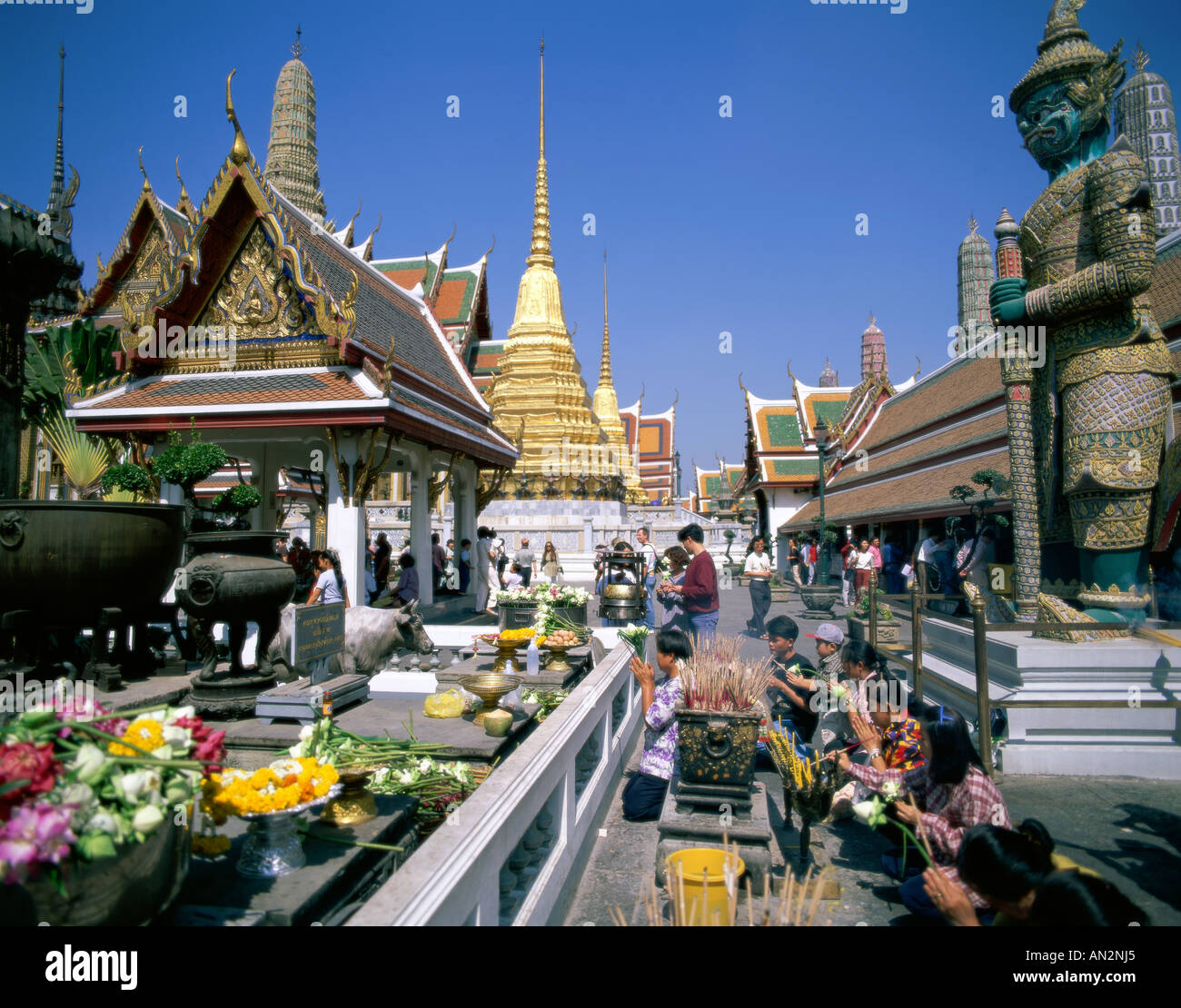 People preying hi-res stock photography and images - Alamy