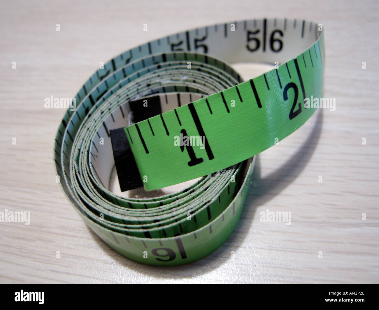 Measuring inches centimeters roll hi-res stock photography and images ...