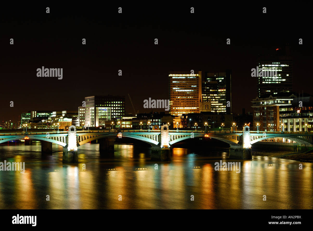photograph of the millenium bridge in london at night Stock Photo - Alamy