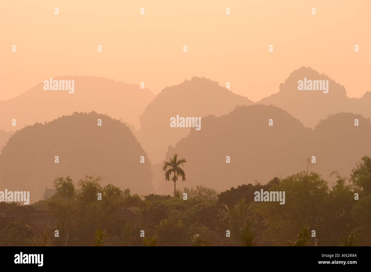 sunset limestone mountain scenery Tam Coc Ninh Binh south of Hanoi ...