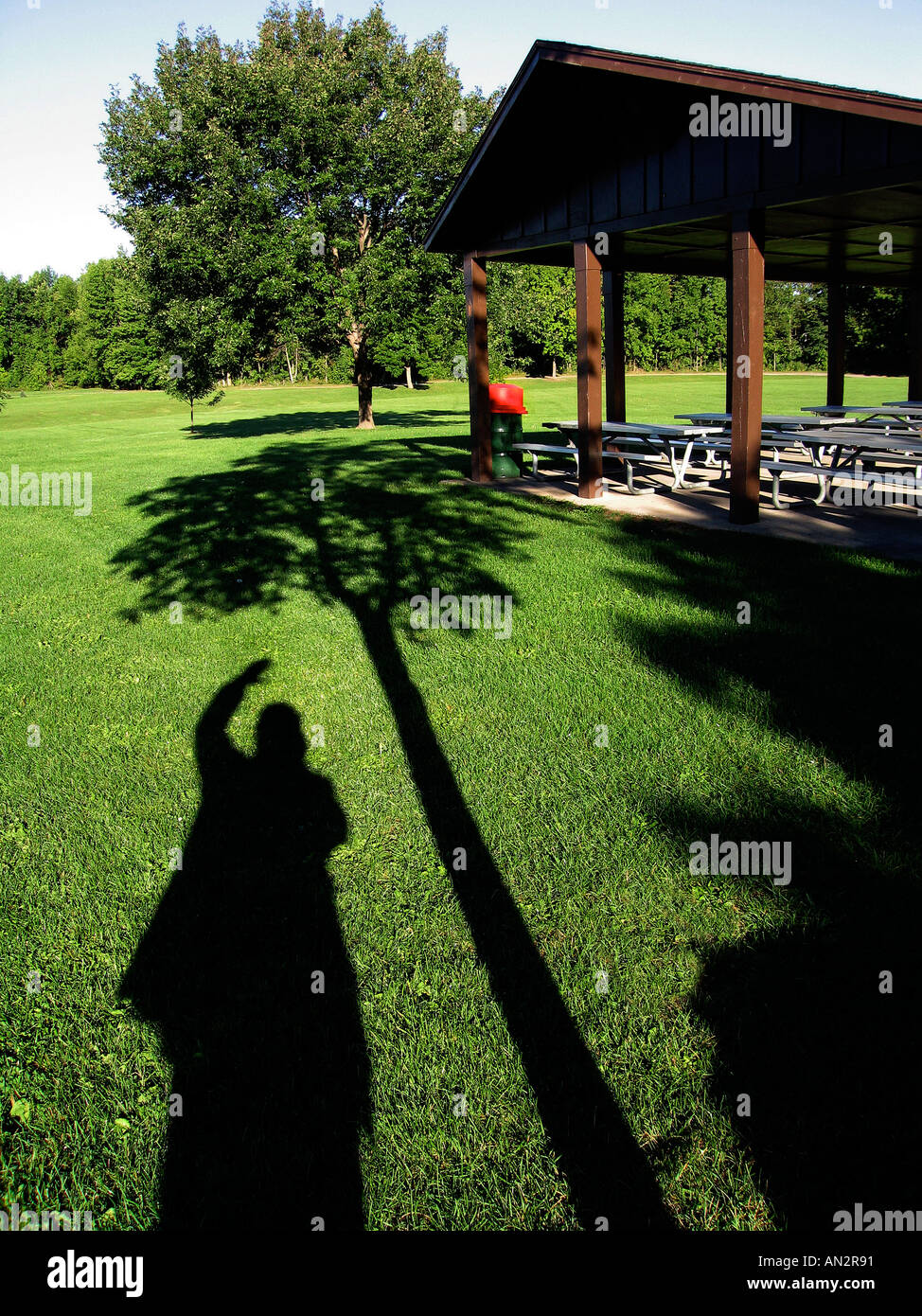 Park shelter with photographers shadow Stock Photo - Alamy