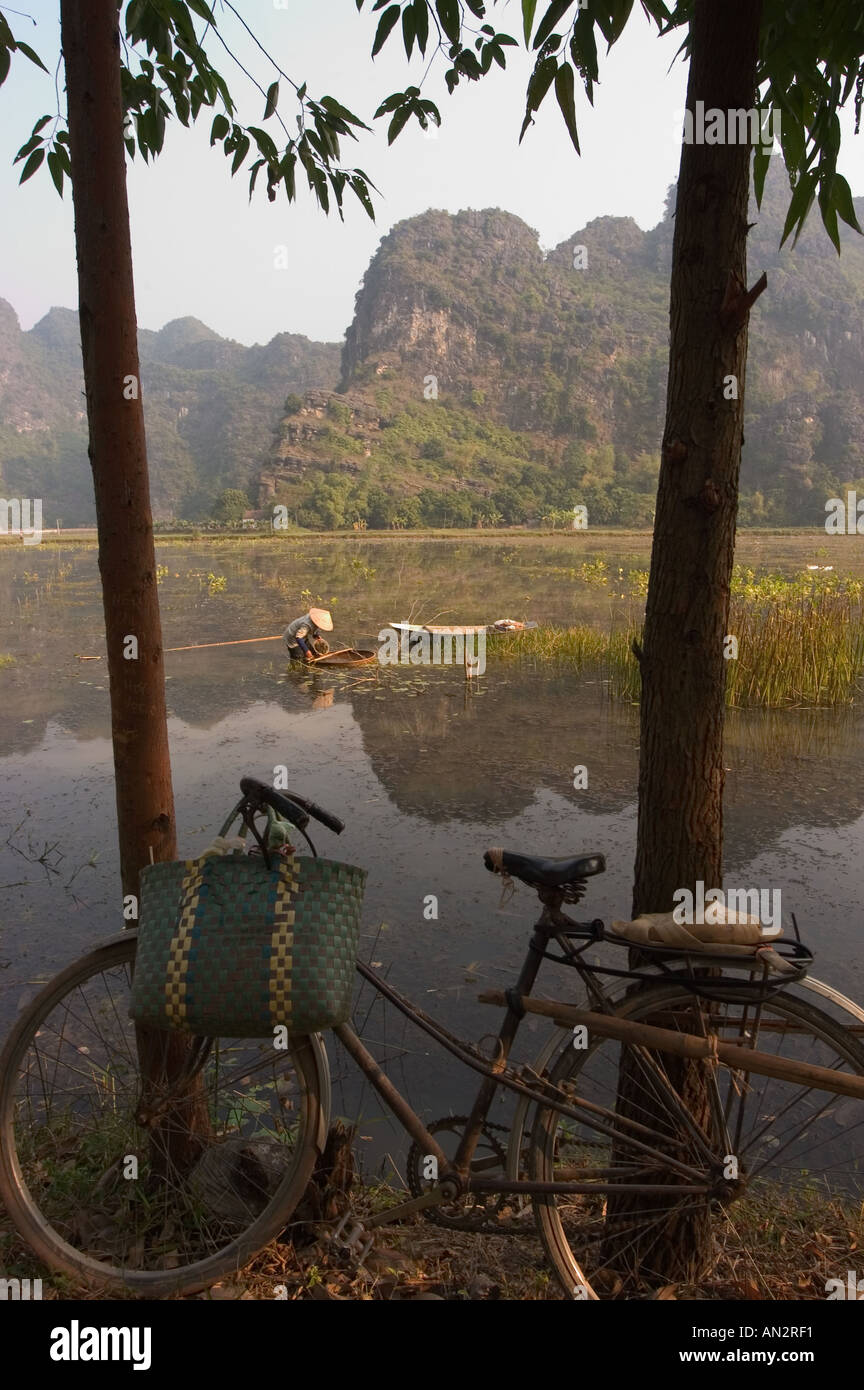 bicycle limestone mountain scenery Tam Coc Ninh Binh south of Hanoi ...