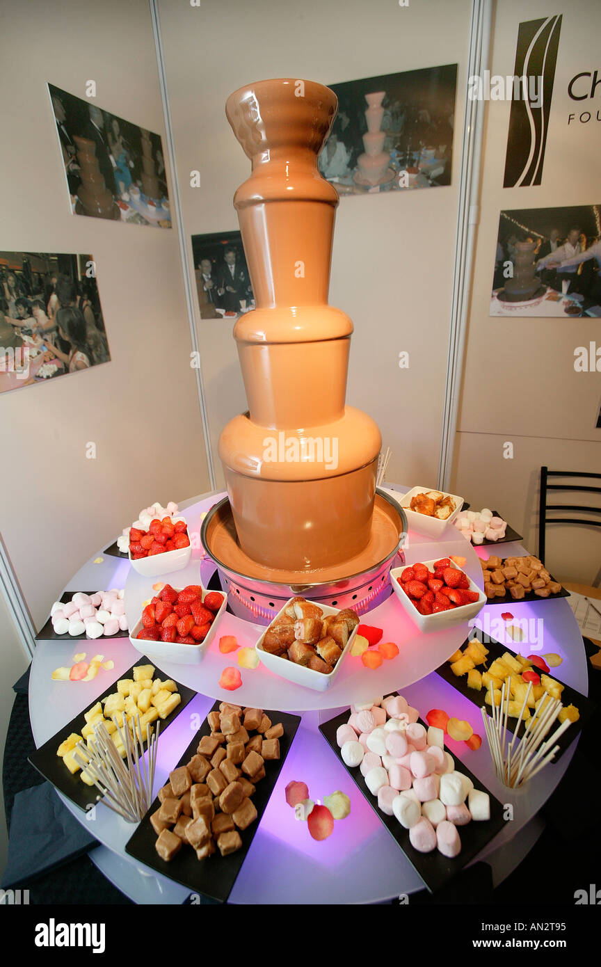 Strawberries in chocolate fountain hi-res stock photography and images ...