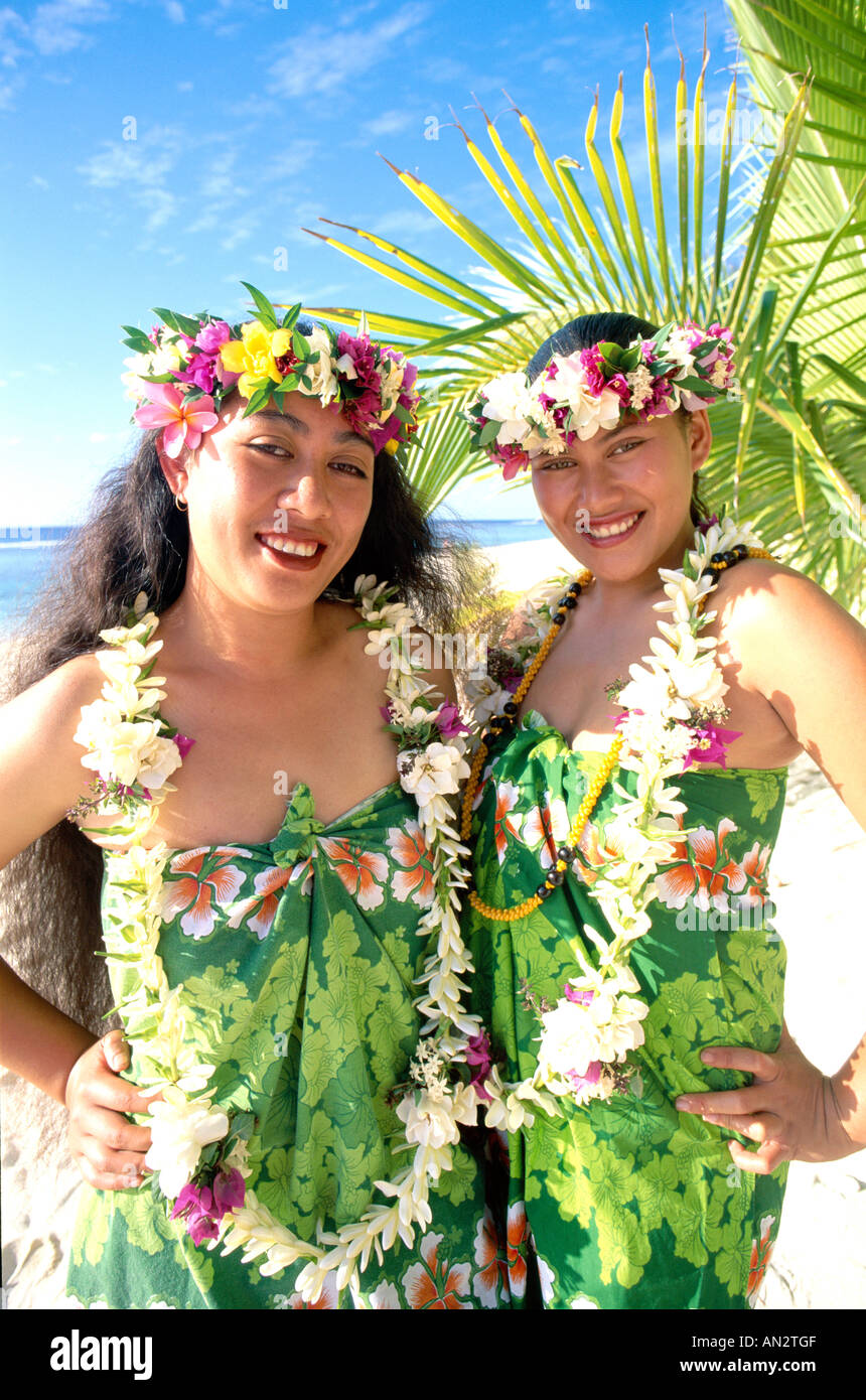 Polynesian Girls Dressed In Pareu Sarong And Leis Flower Garlands