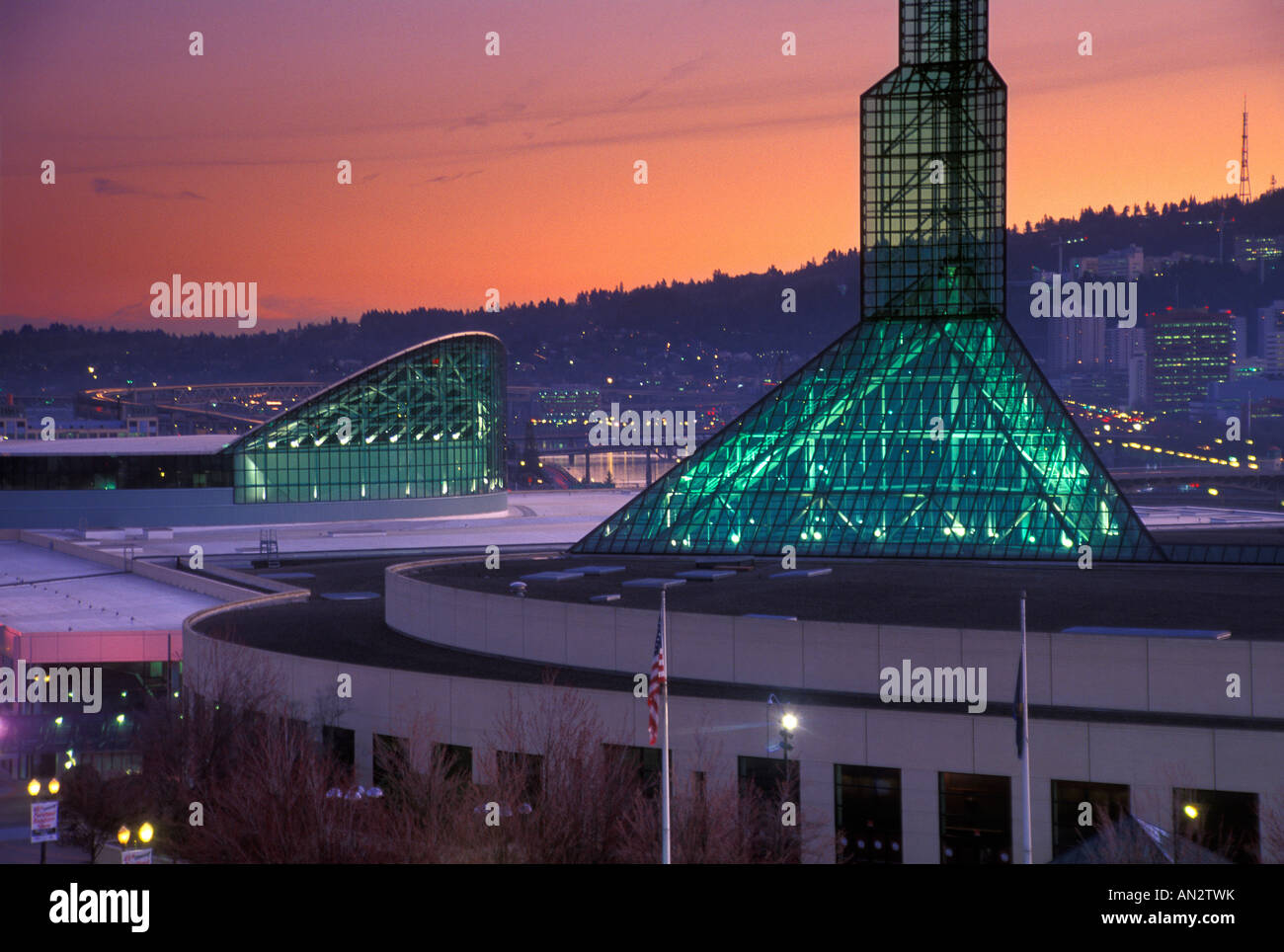 The Oregon Convention Center during a colorful sunset, in Portland ...