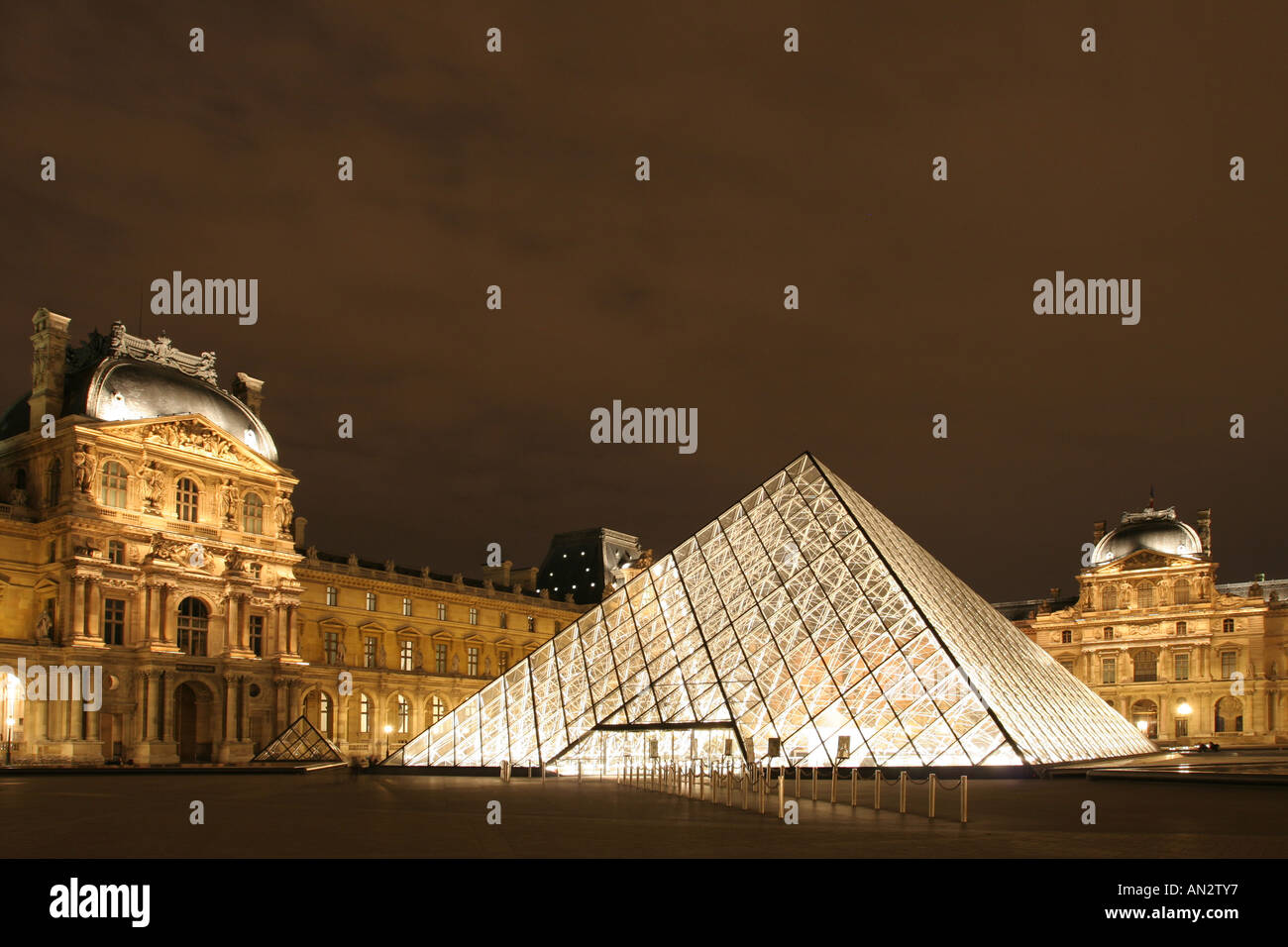 Louvre Pyramid at night, Paris, France Stock Photo - Alamy