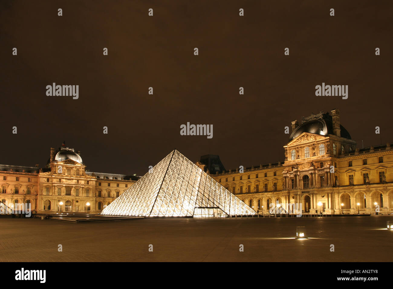 Louvre Pyramid at night, Paris, France Stock Photo - Alamy