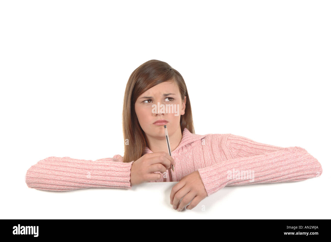 a cutout of a teenage girl writing a letter thinking hard what to say ...