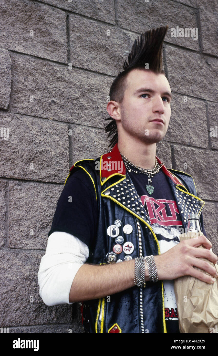 Young Punk Teen Drinking On Street Corner Stock Photo - Alamy