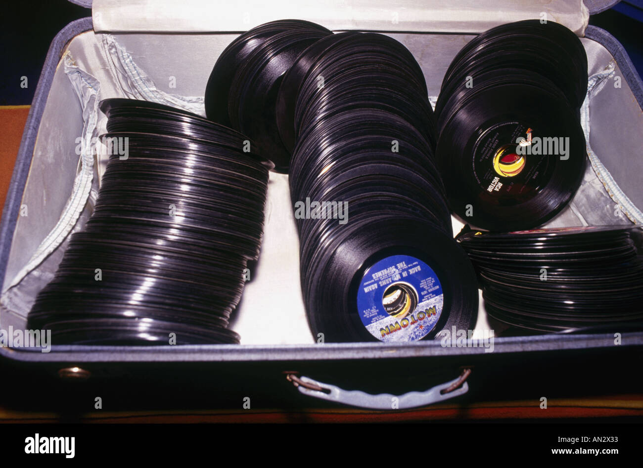 Old 45 RPM Records in Suitcase Stock Photo - Alamy