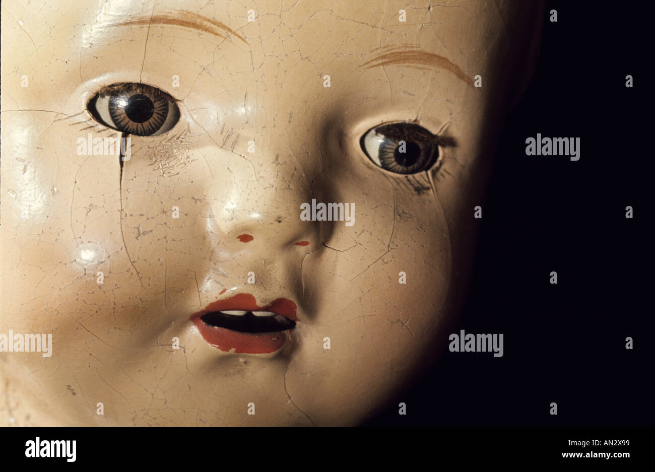 Broken doll head Stock Photo - Alamy