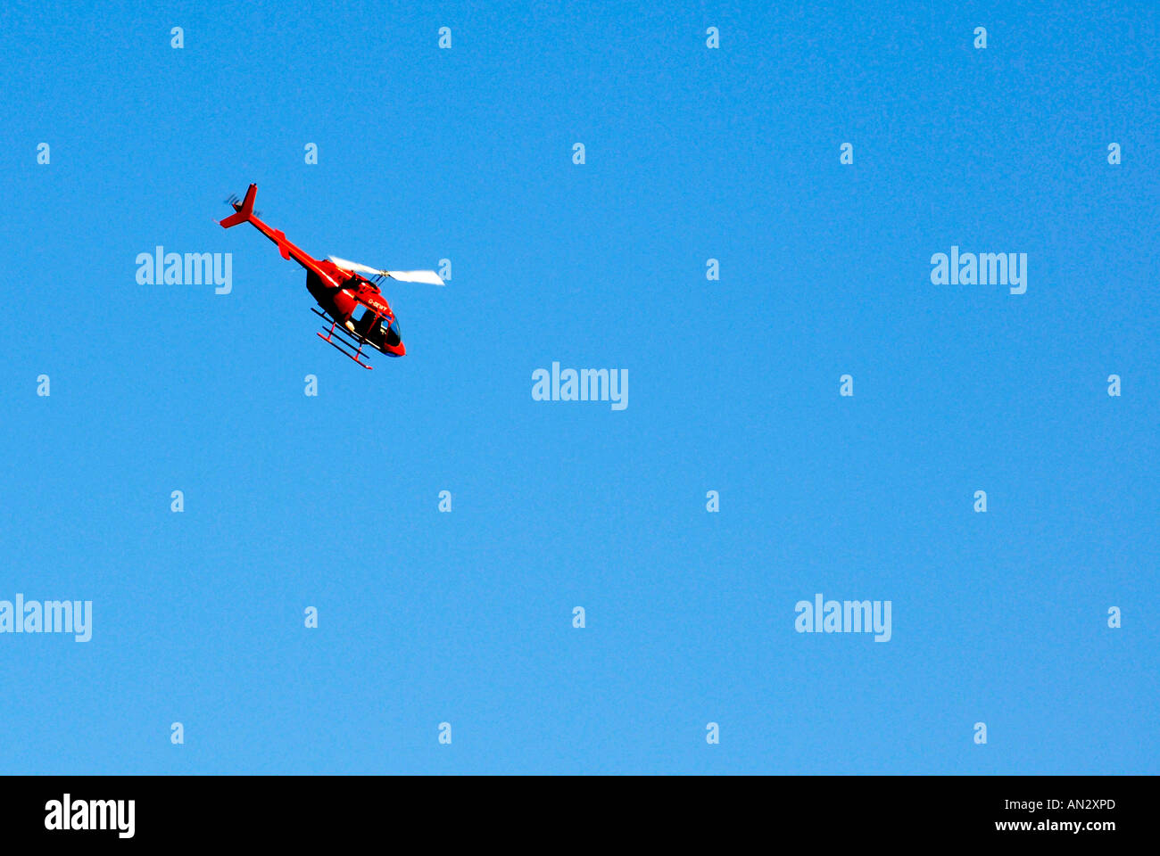 Helicopter in flight Stock Photo - Alamy