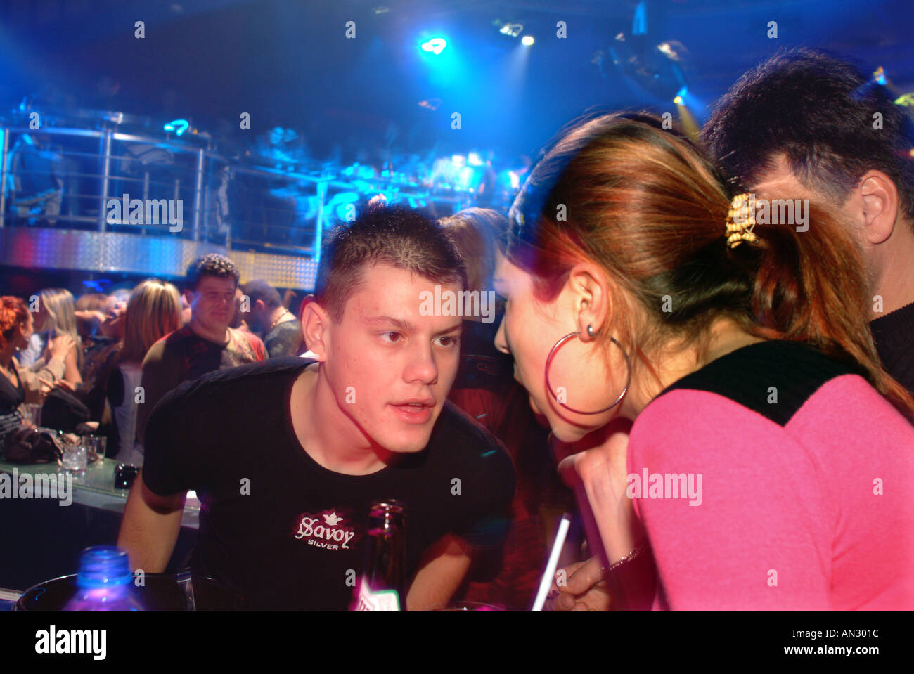 young girl ordering drinks in a night club Stock Photo - Alamy