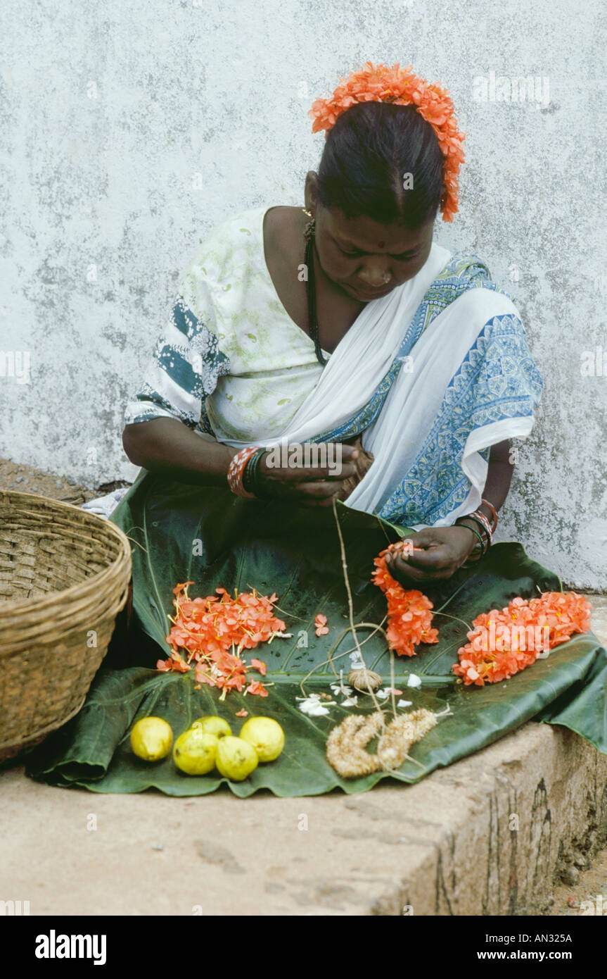 Indian woman making floral ornament in Goa, India Stock Photo - Alamy