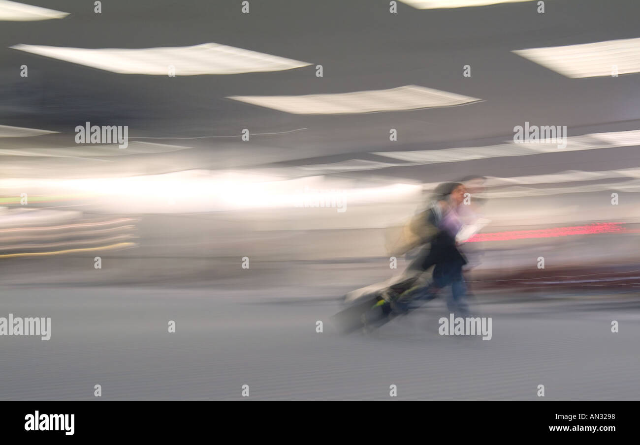 Rushing Through Airport Stock Photo - Alamy