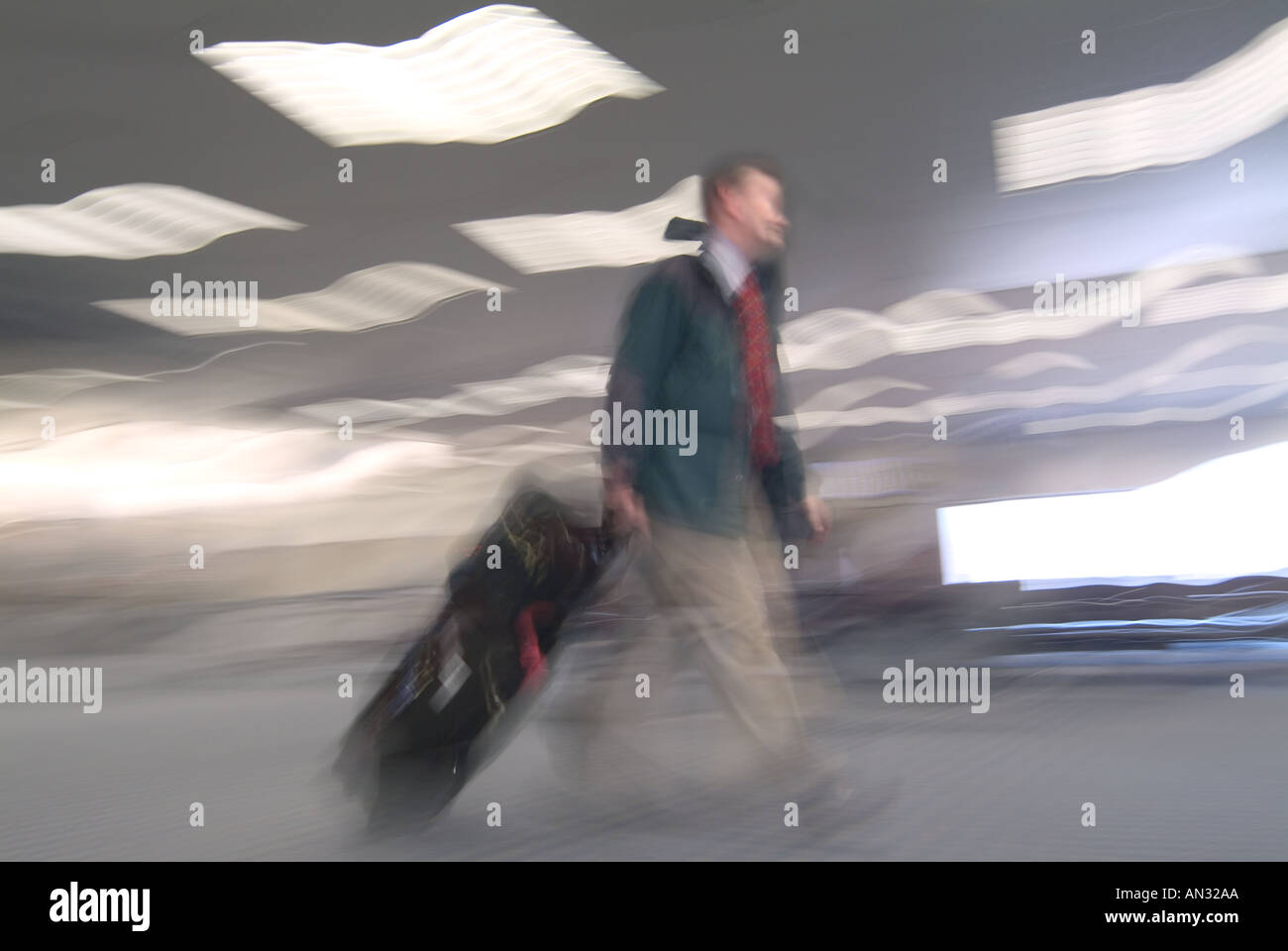Running through airport hi-res stock photography and images - Alamy
