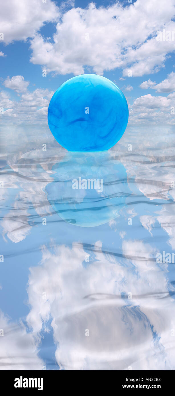 Floating Blue Ball In Water With Blue Sky And Clouds Abstract Idea ...