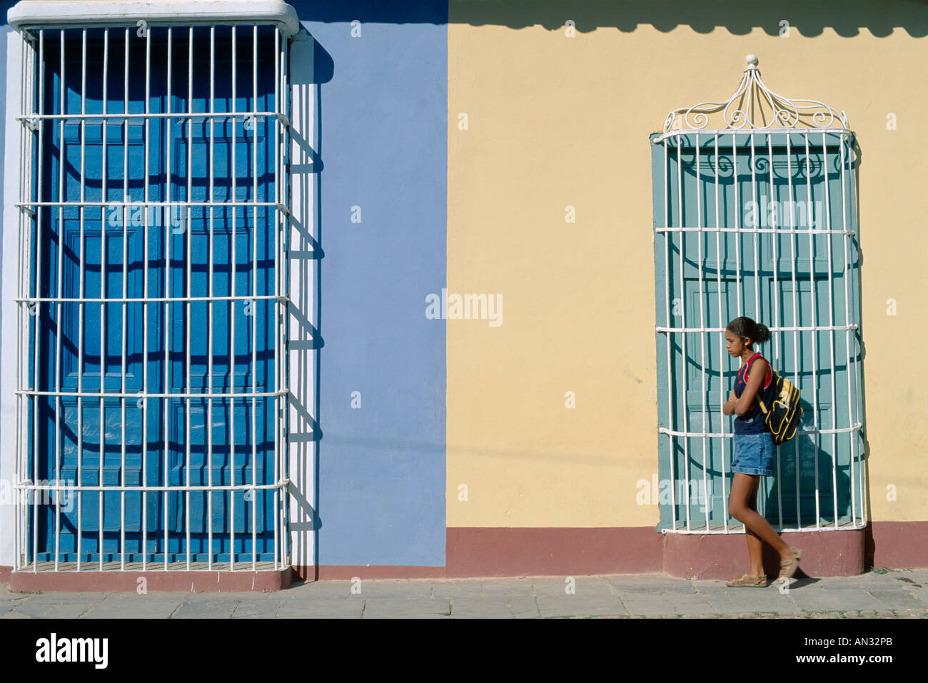 Street Scene / Colonial Grille Windows / Woman Walking, Trinidad, Cuba ...