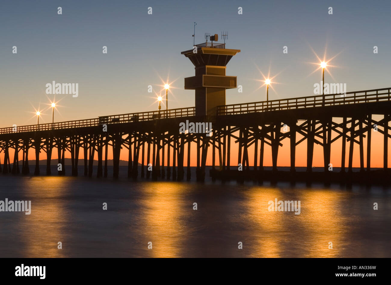 Sunset at Seal Beach Pier in Seal Beach, California USA. Seal Beach is ...