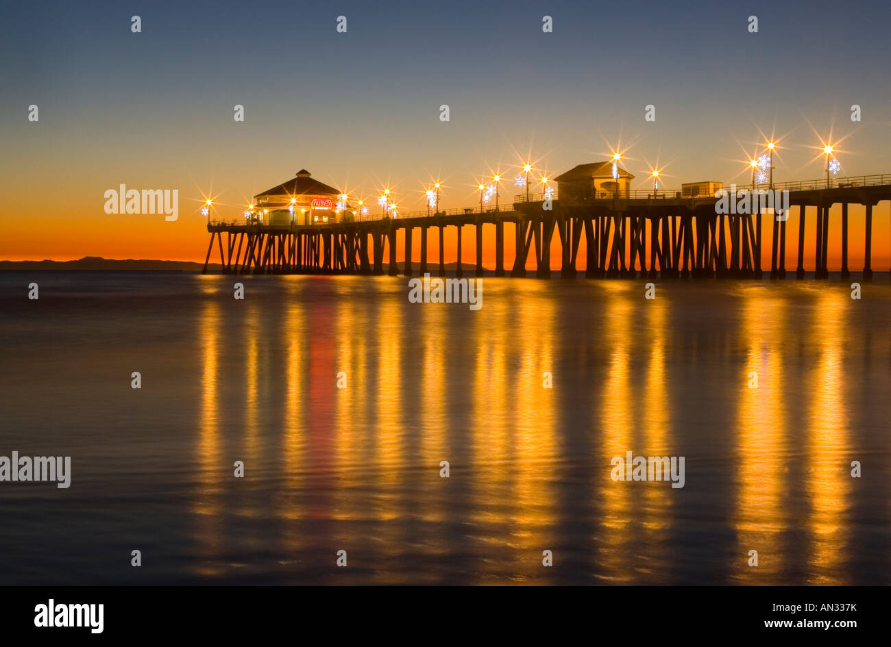 Sunset at Huntington Beach Pier in Huntington Beach, California USA ...