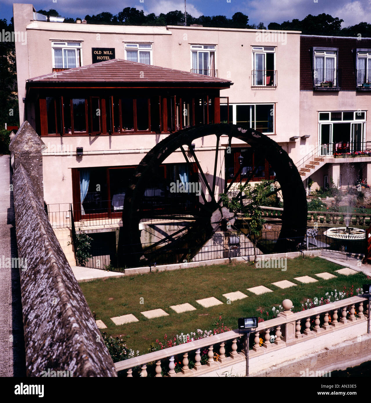 Water wheel at the Old Mill hotel and restaurant Bathampton near Bath ...