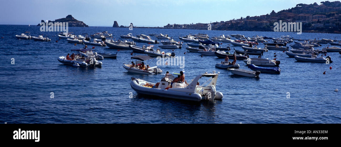 People in inflatable dingys Capo Mulini Sicily Italy Stock Photo - Alamy
