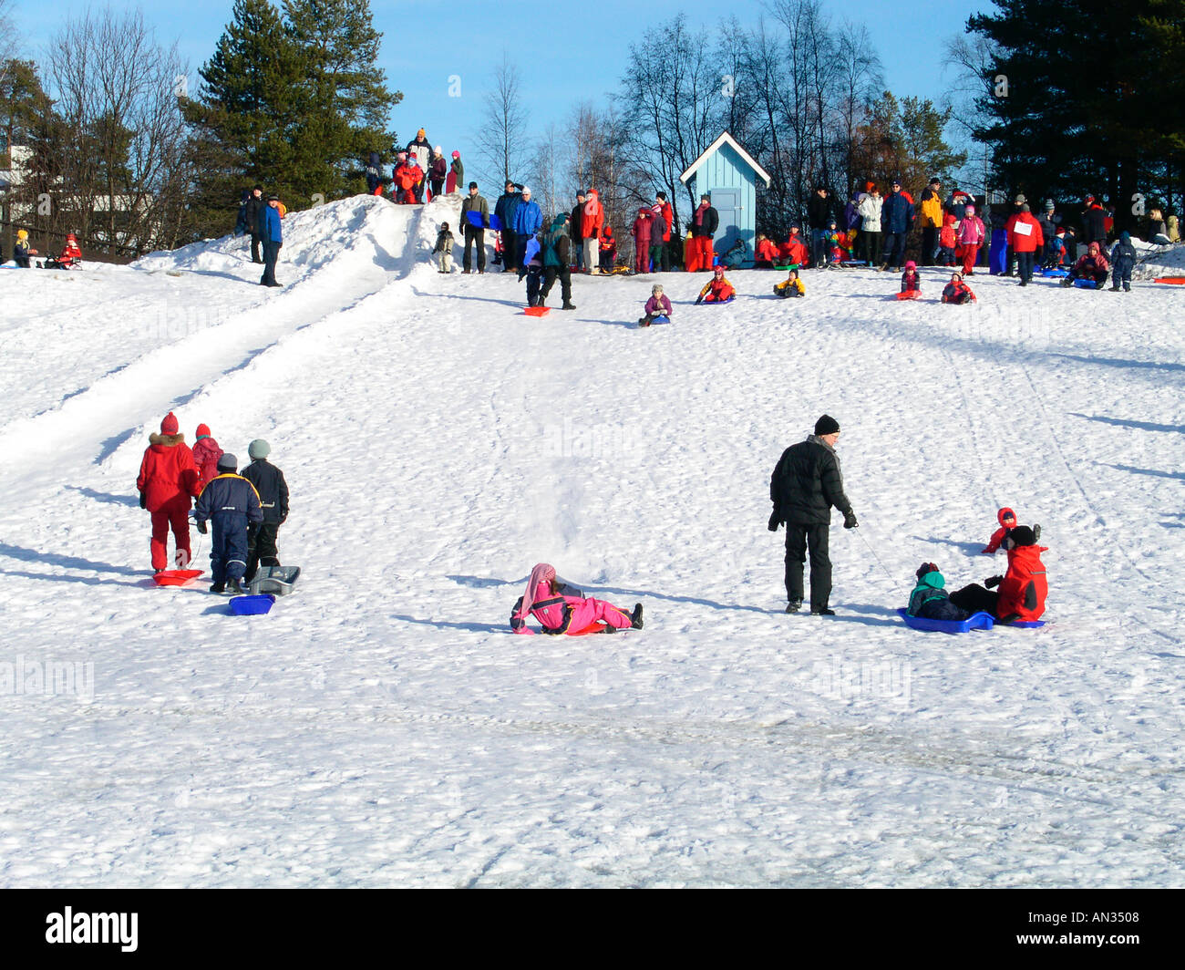 Children sledding hill hi-res stock photography and images - Alamy