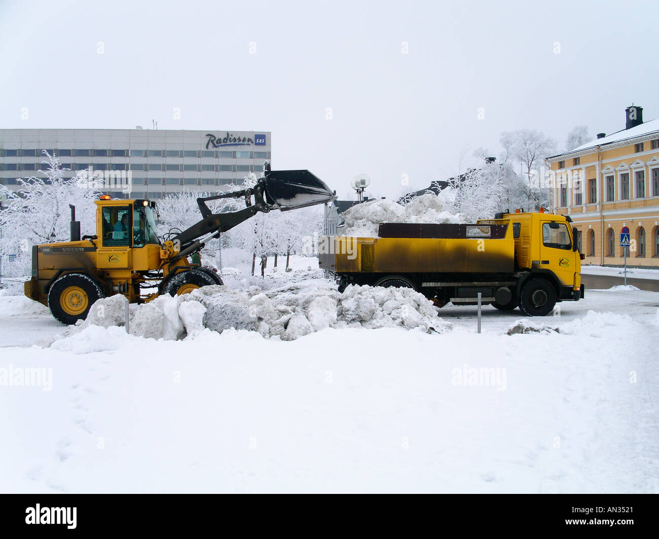 Tractors plowing snow hi-res stock photography and images - Alamy