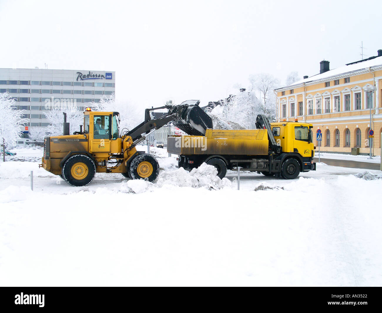 Tractors plowing snow hi-res stock photography and images - Alamy