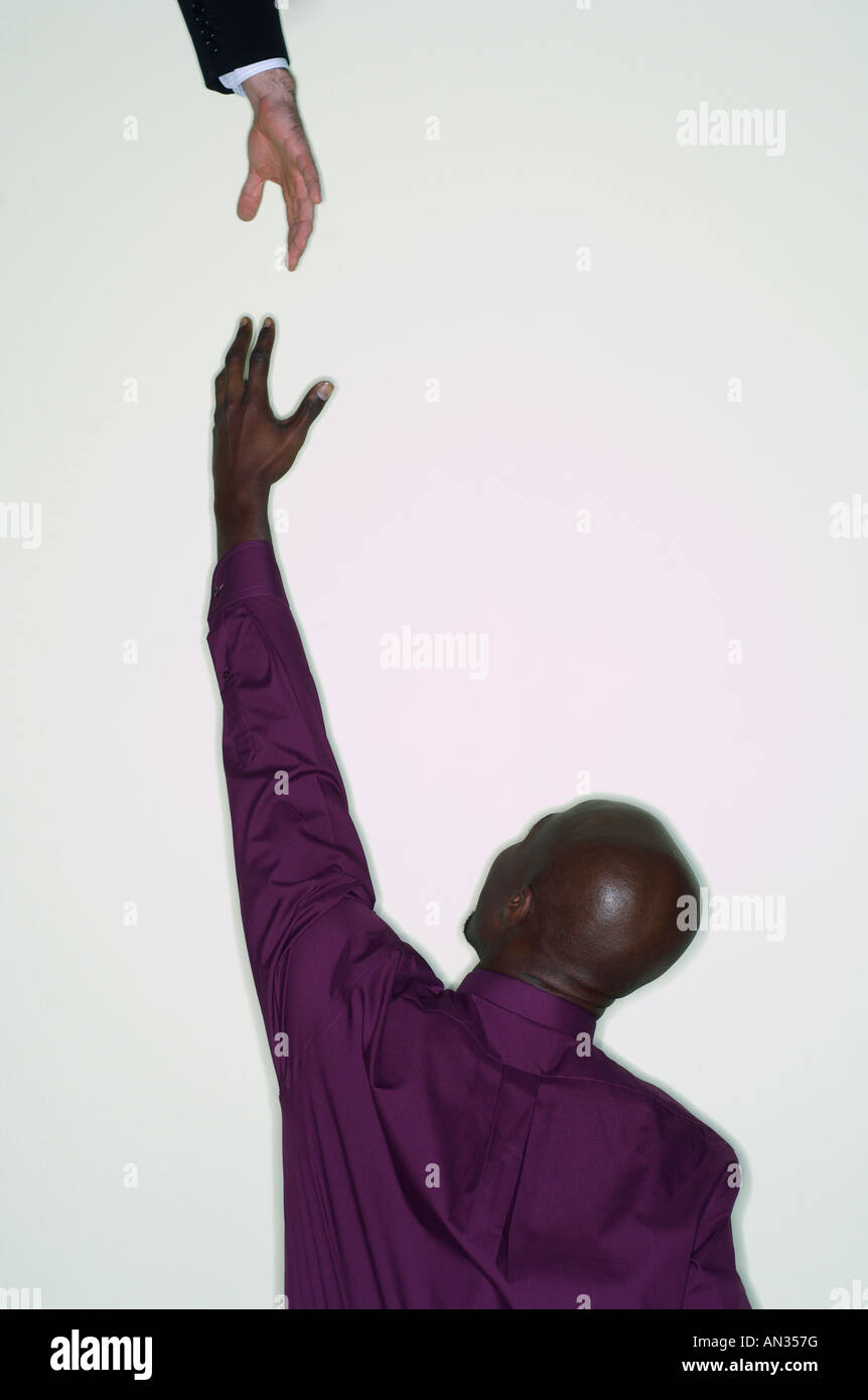 African american man extending arm hi-res stock photography and images ...