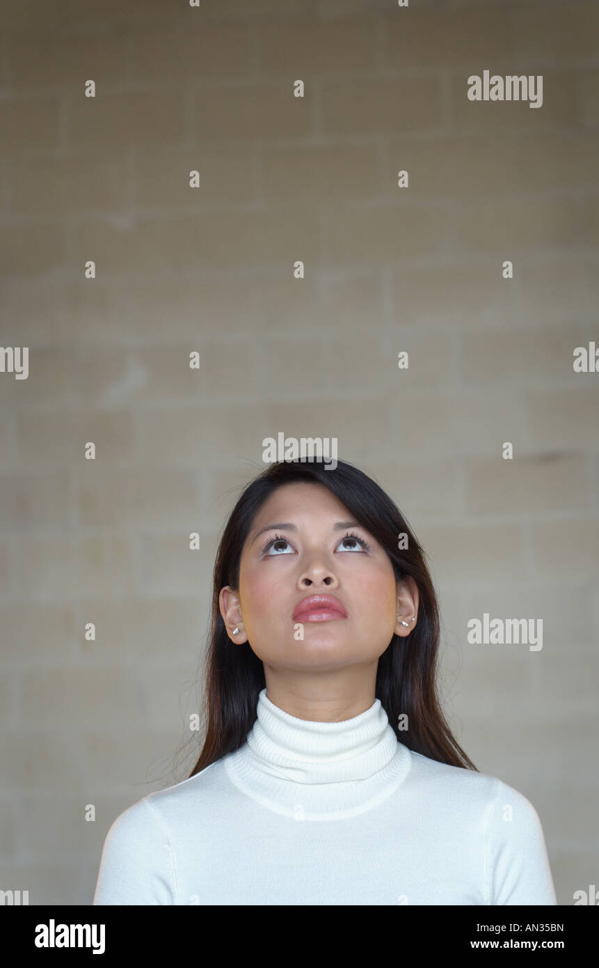 Portrait of Asian woman looking up Stock Photo - Alamy