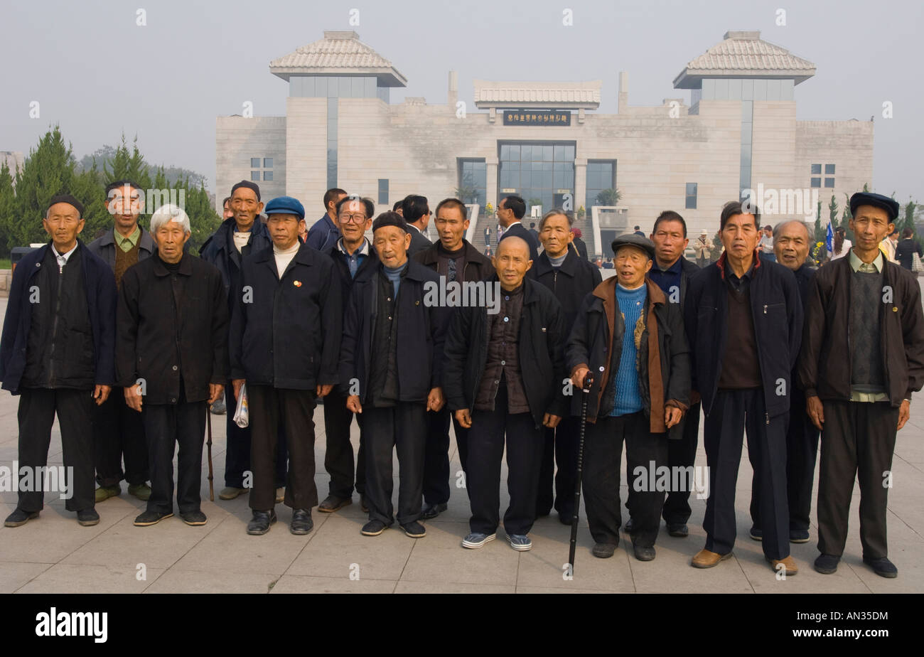 China Xian group of elderly men from a rural area pausing for a group ...