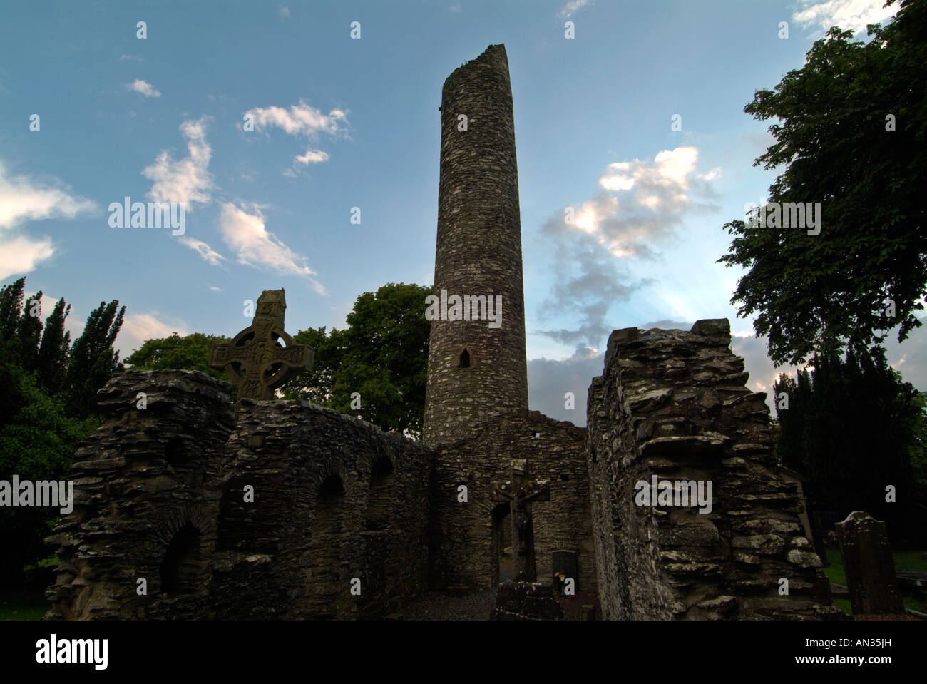The round tower beside the Cross of Muiredach a famous 10th century ...