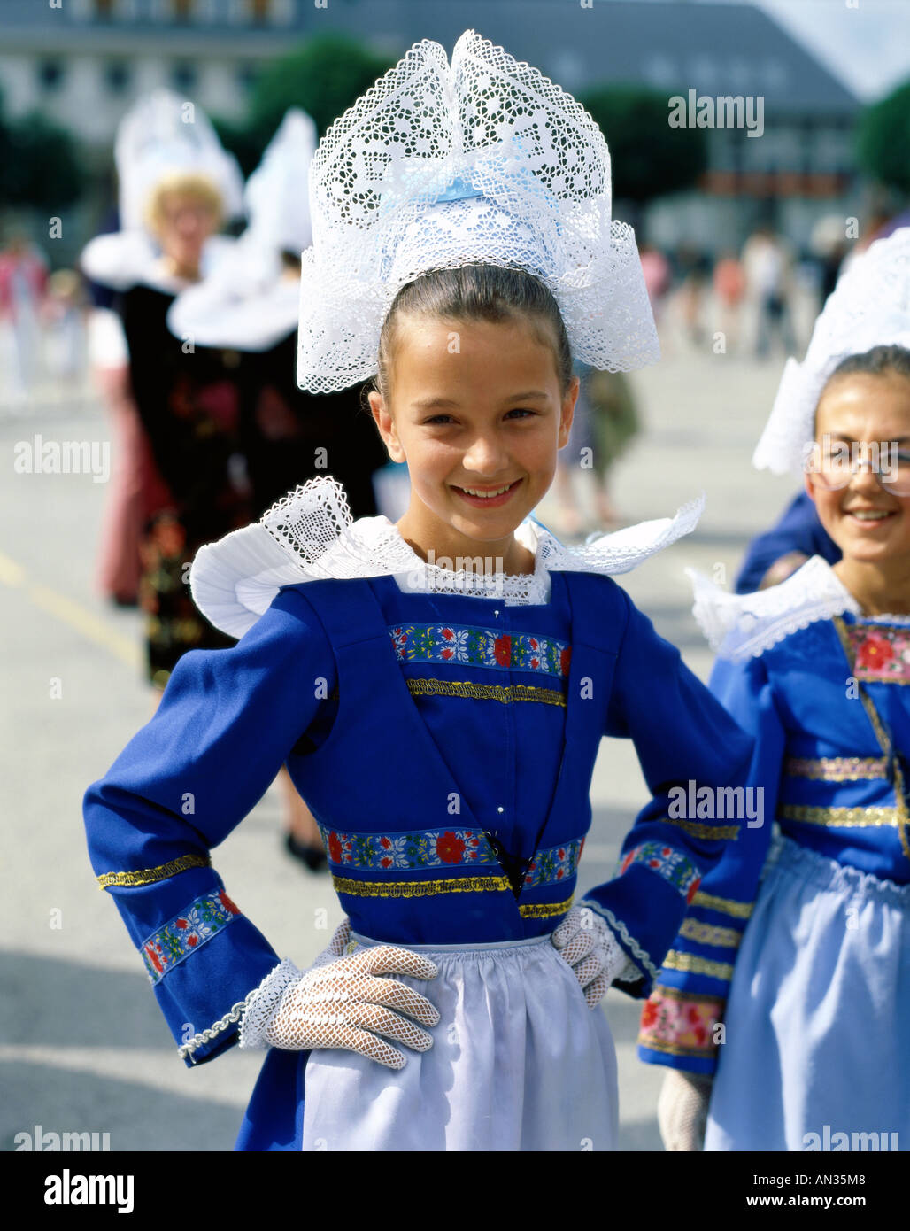 Girl in Traditional Costume wearing Lace Headdress (Coiffes), Brittany ...