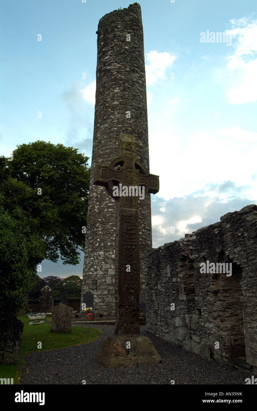 Closeup of the round tower and the Cross of Muiredach a famous 10th ...