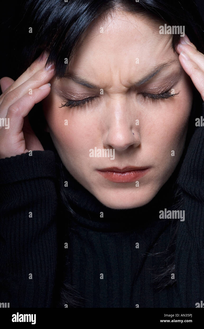 Rub rubbing temples head hi-res stock photography and images - Alamy