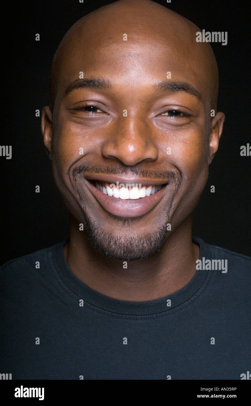 Close up of African man smiling Stock Photo - Alamy