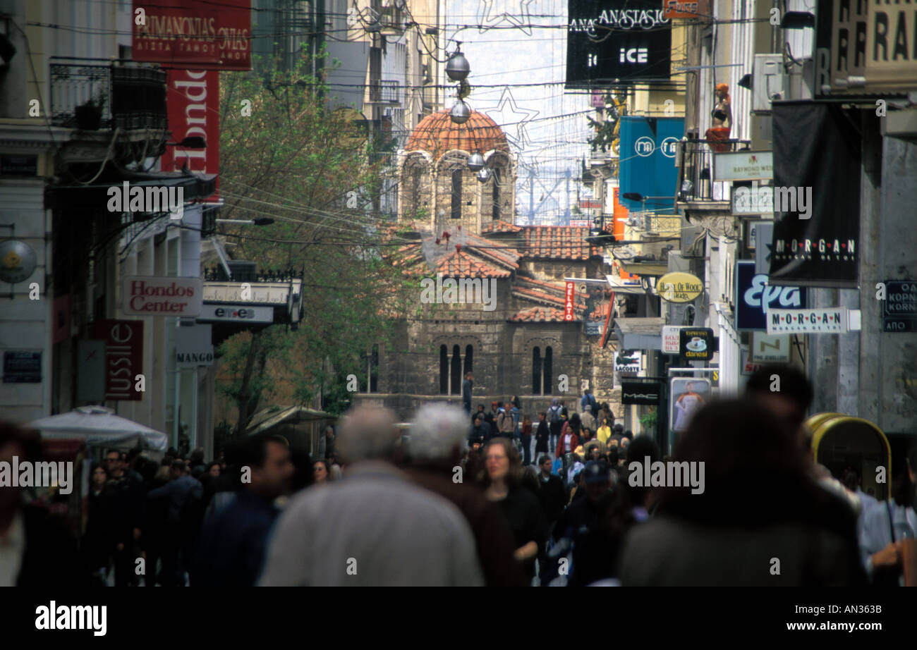Crowds walking in the popular shopping centre of Ermou Street in Athens ...
