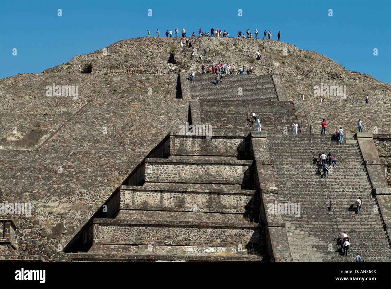 Tourists climbing the Pyramid of the Sun at the ancient Aztec ...