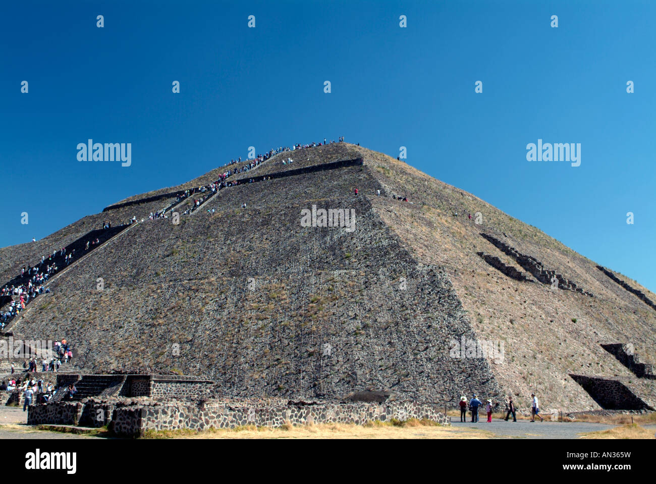 Long line of tourists climbing the Pyramid of the Sun at the ancient ...