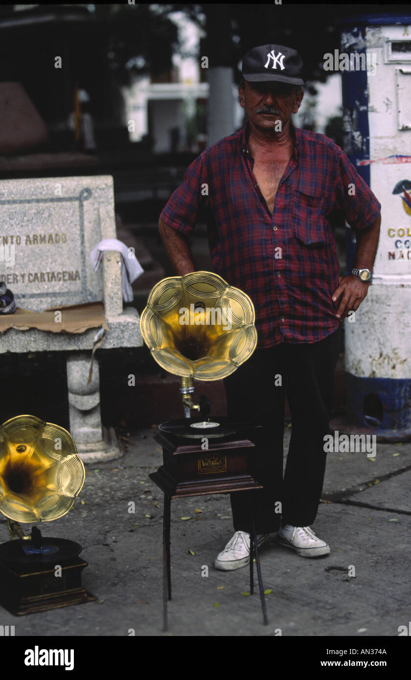 man proudly displays record player Stock Photo - Alamy