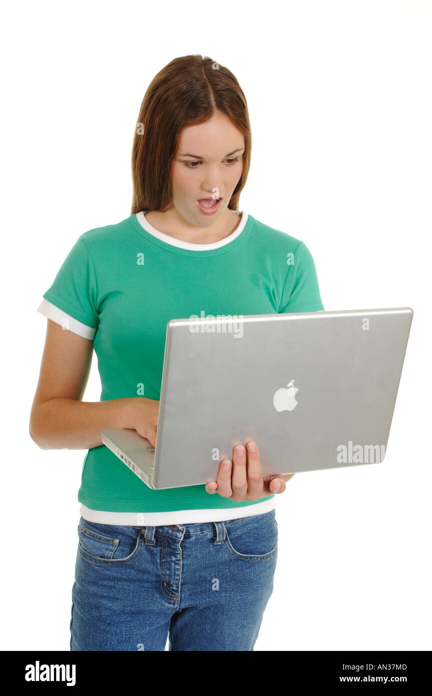 a teenage girl using a ibook laptop Stock Photo - Alamy