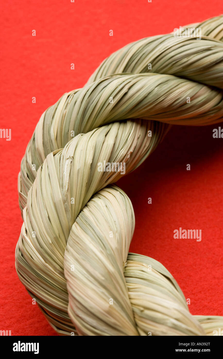 Sacred straw rope Stock Photo - Alamy