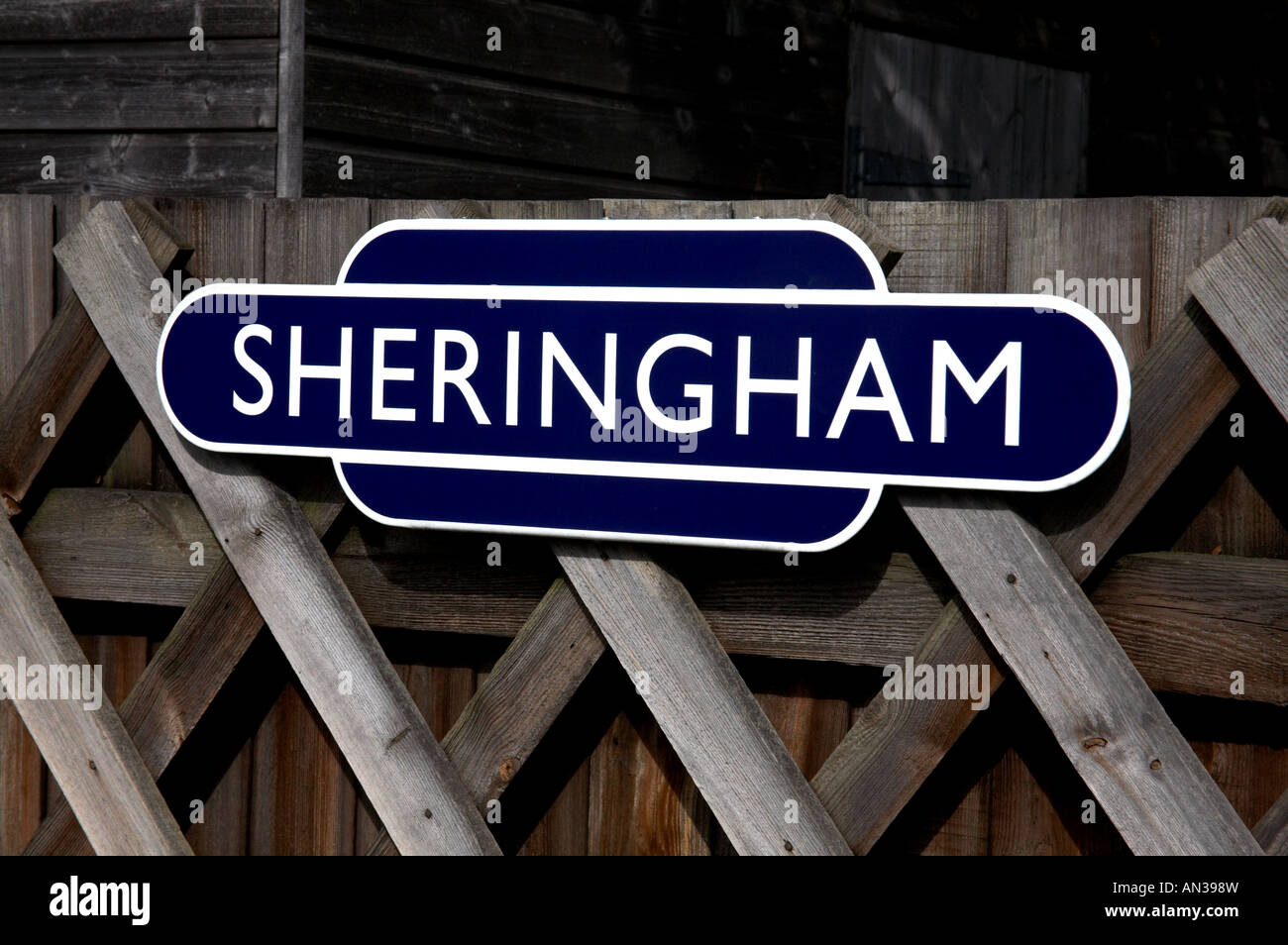 Sherringham 'Poppy Line' railway station sign on wooden lattice work ...