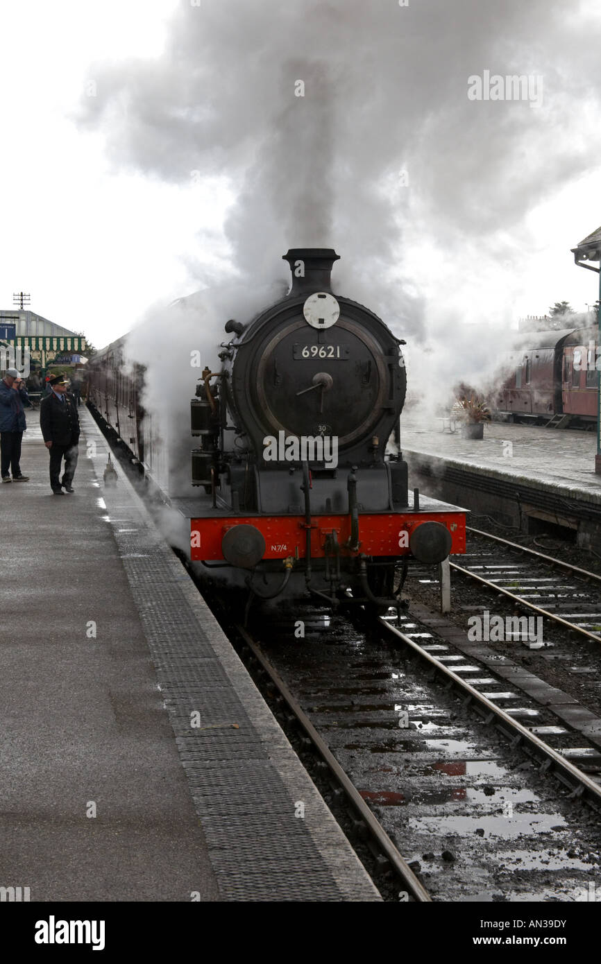 Steam locomotive British Rail number 69621 0-6-2 tank engine with guard ...