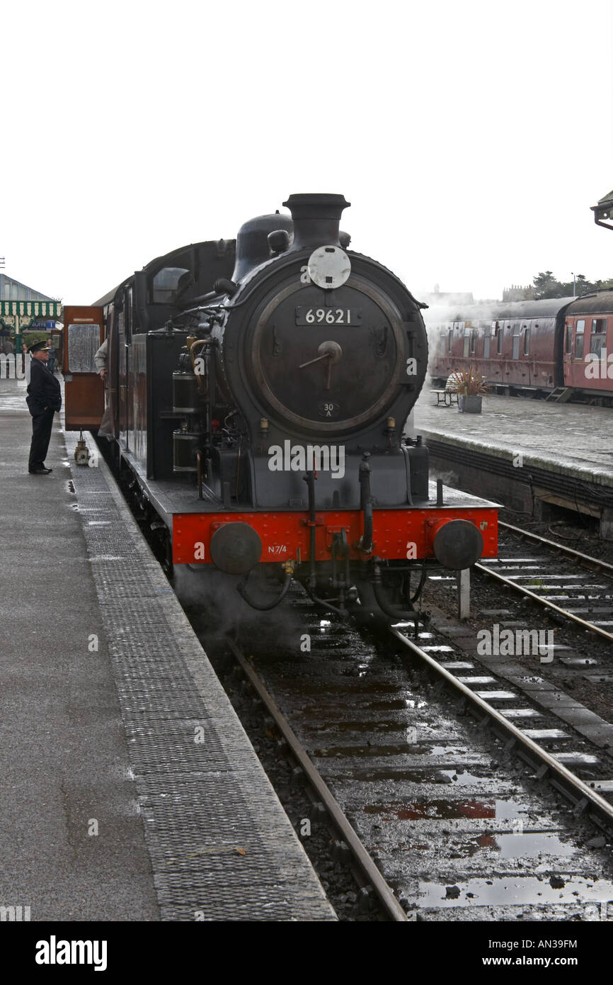 Steam locomotive British Rail number 69621 0-6-2 tank engine with guard ...